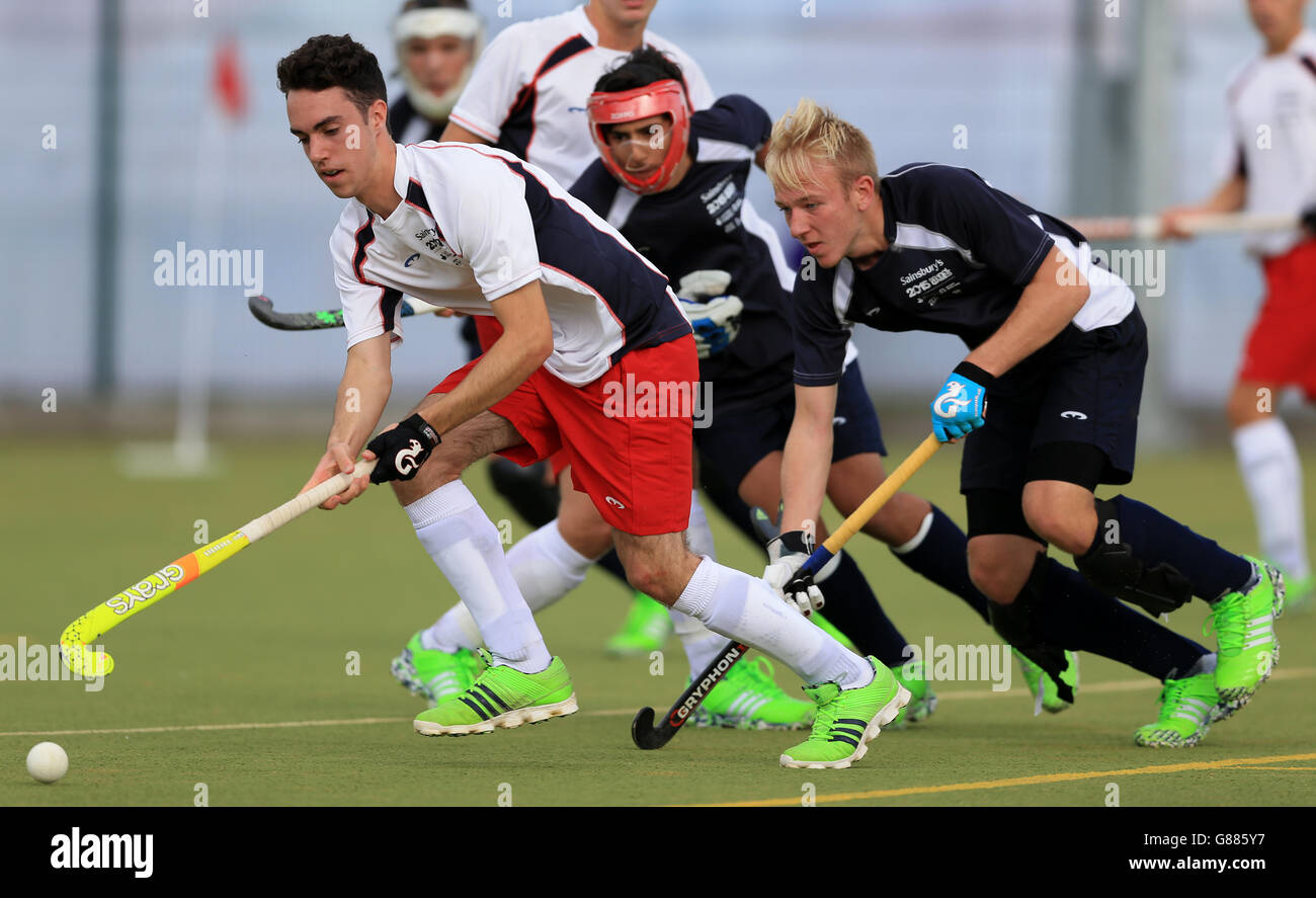 England Blue Boys Evan Kimber (white) in action against Scotland during ...