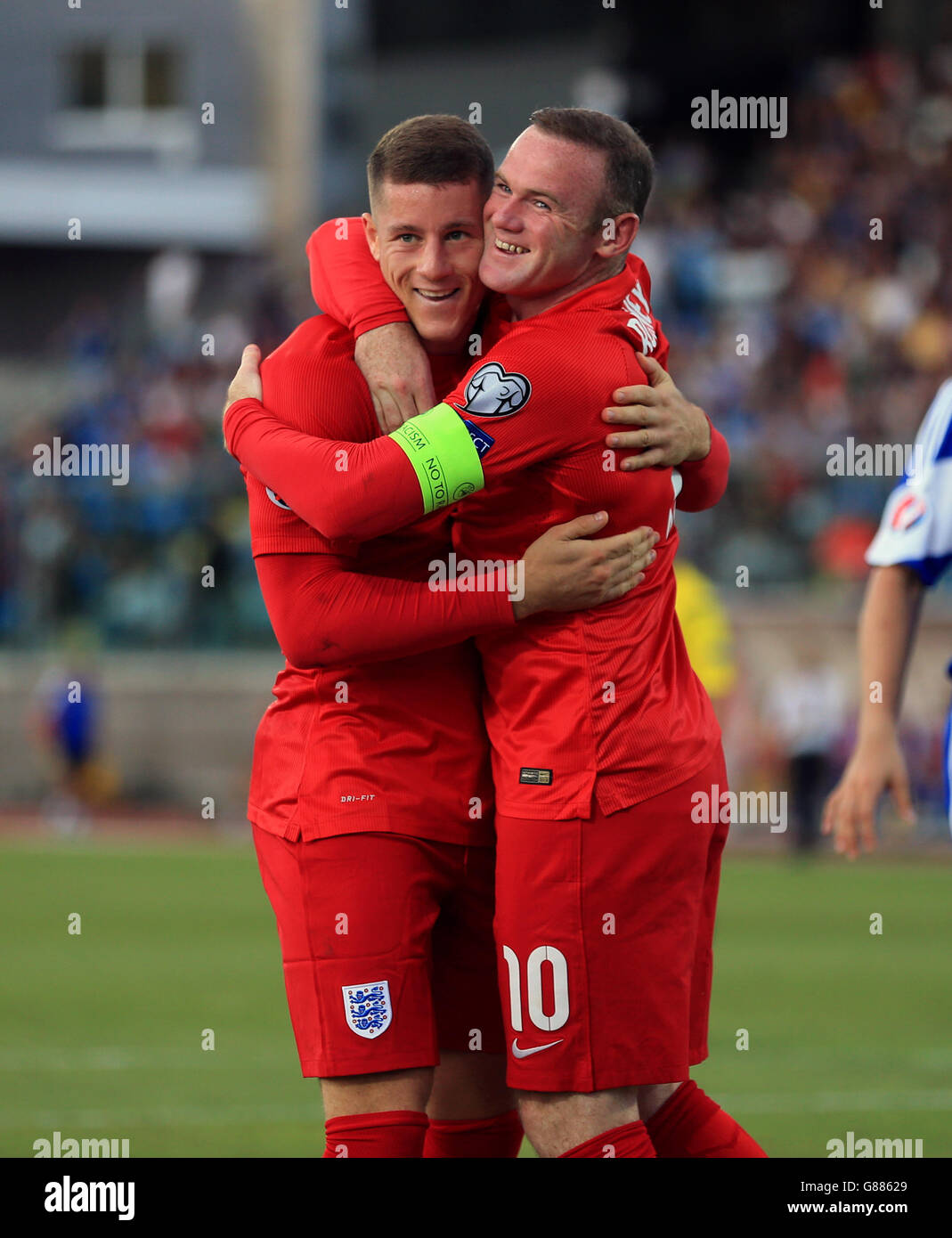 England's Ross Barkley (left) celebrates scoring his side's third goal ...