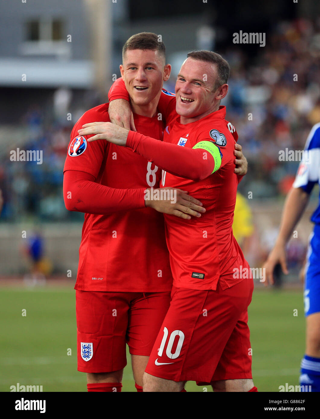 England's Ross Barkley (left) celebrates scoring his side's third goal ...