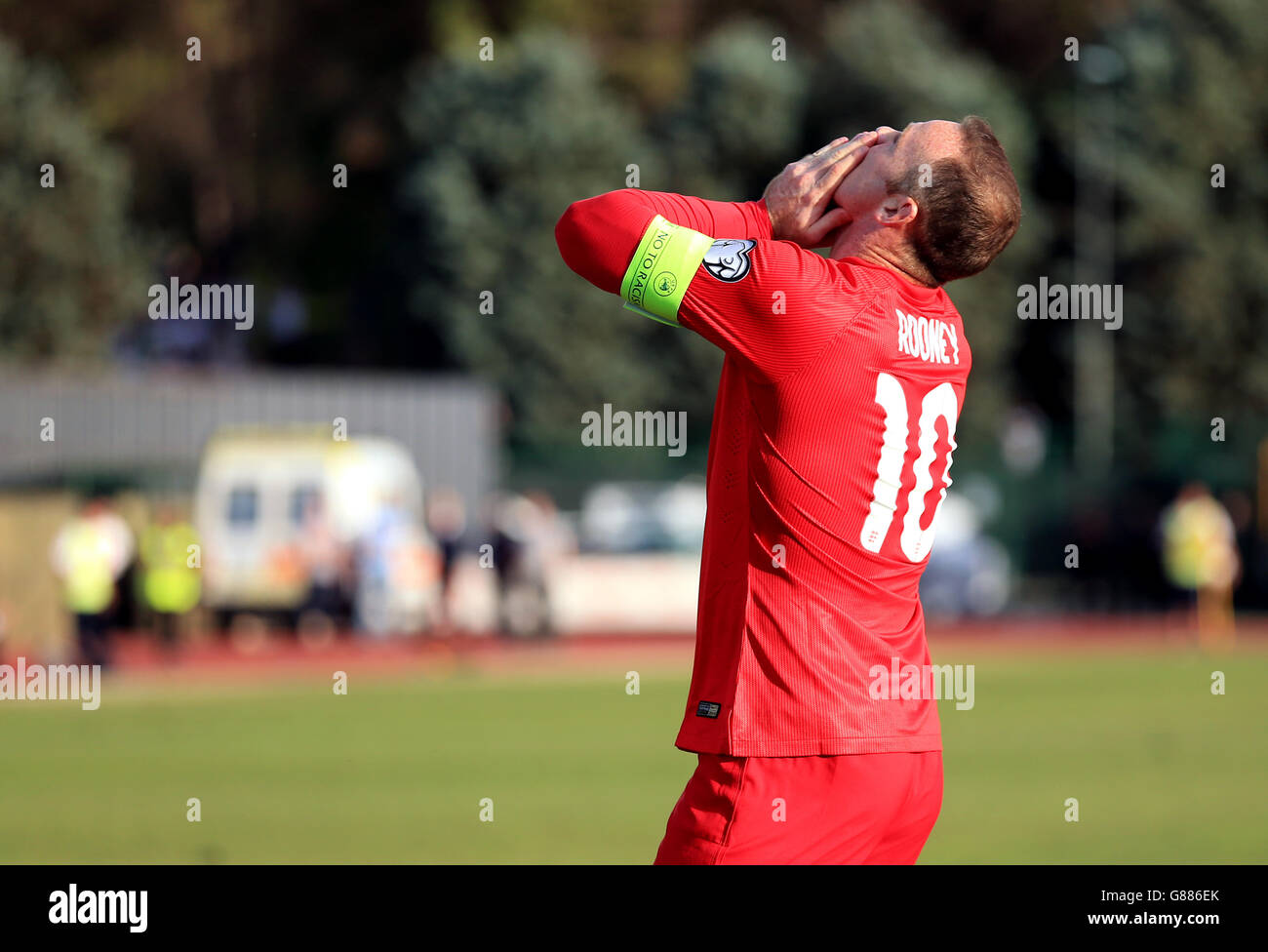 England's Wayne Rooney celebrates scoring his side's first goal of the ...