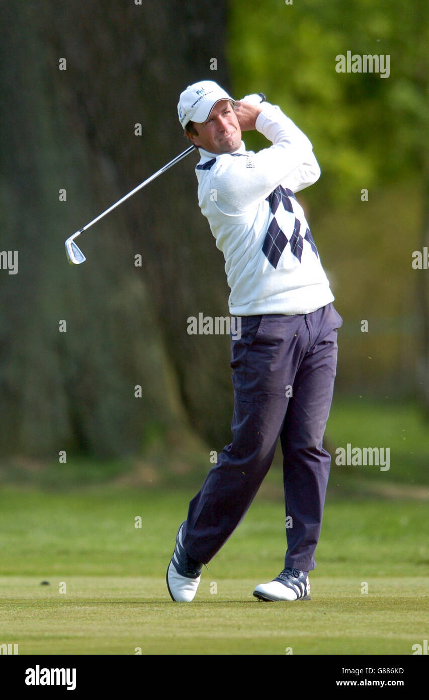Steve webster hits his fairway shot on the 17th hi-res stock ...
