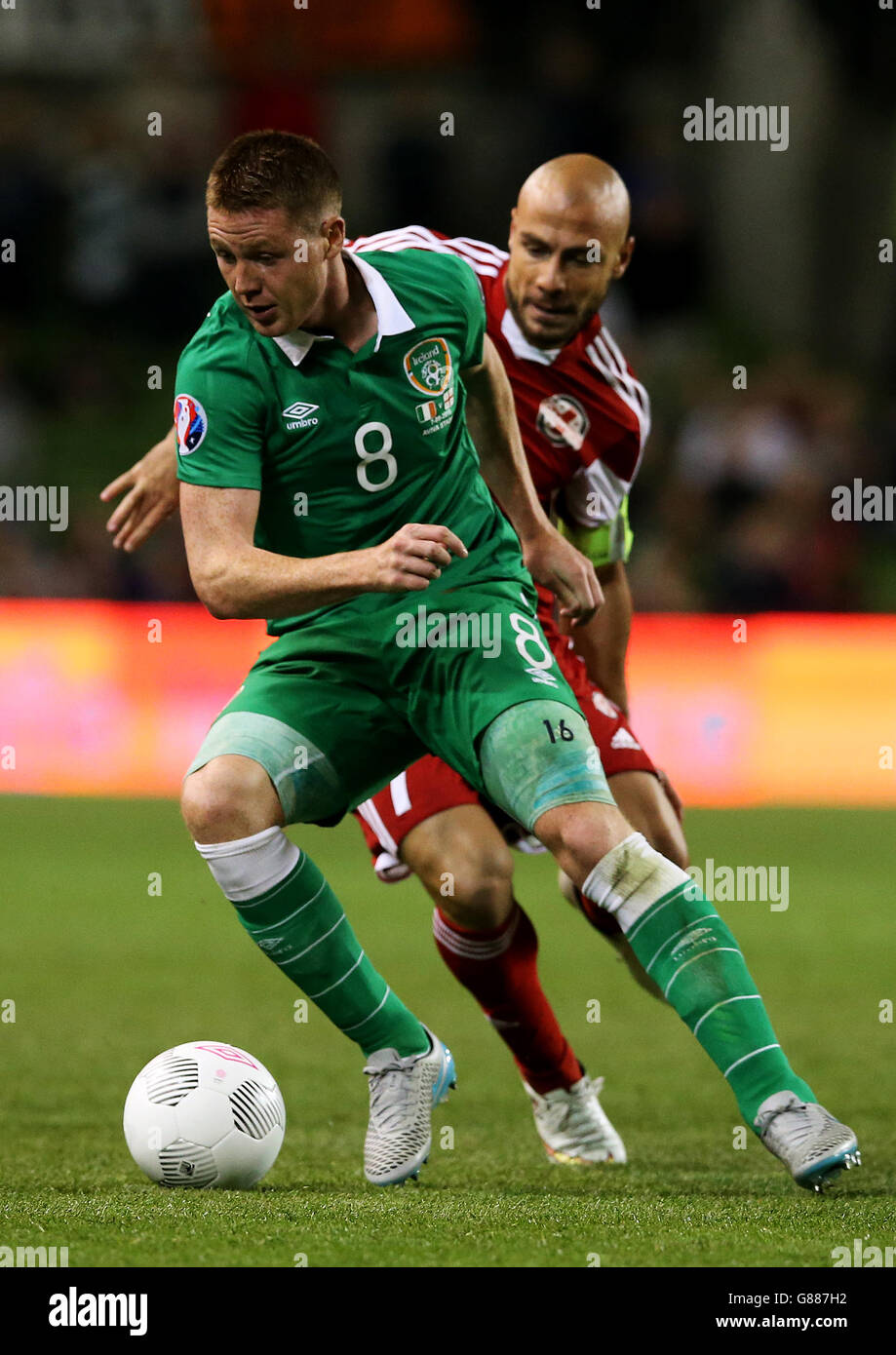 Republic of Ireland's James McCarthy and Georgia's Jaba Kankava (behind ...