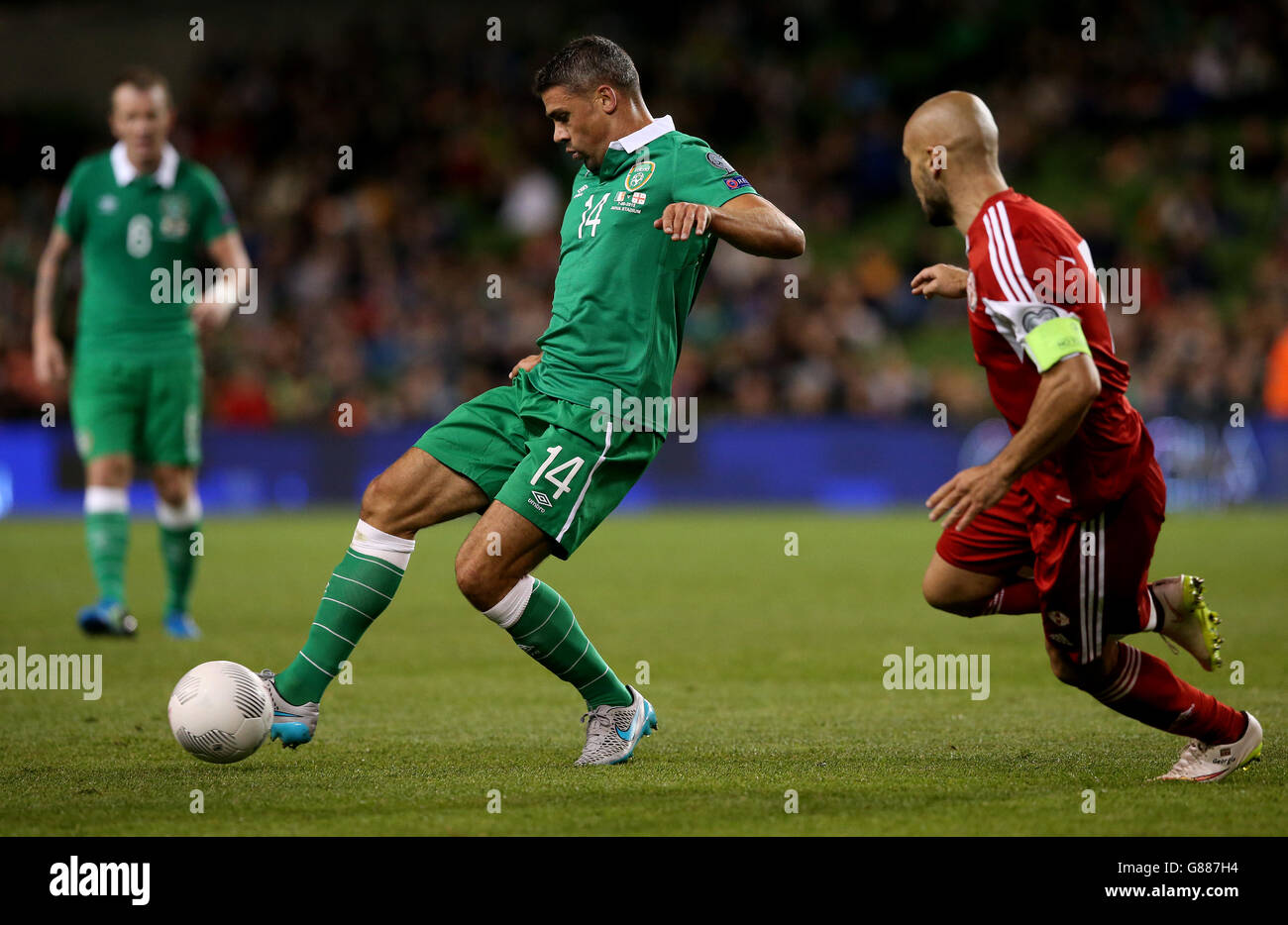 Republic of Ireland's Jon Walters (left) and Georgia's Jaba Kankava ...