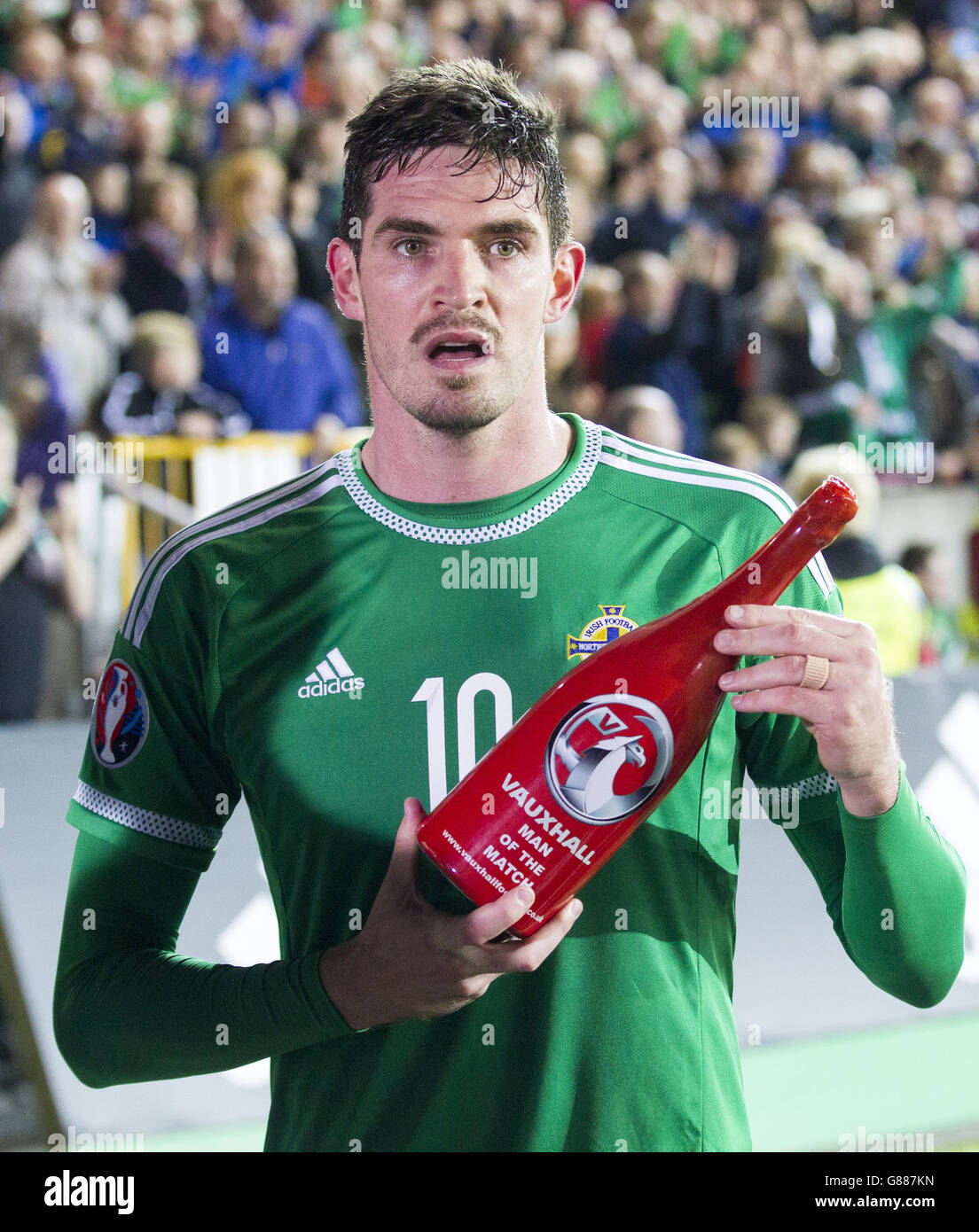 Northern Ireland's Kyle Lafferty receives the Man of the Match award ...