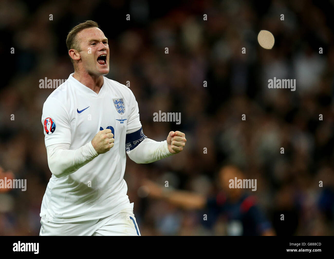 England's Wayne Rooney celebrates scoring his side's second goal of the ...