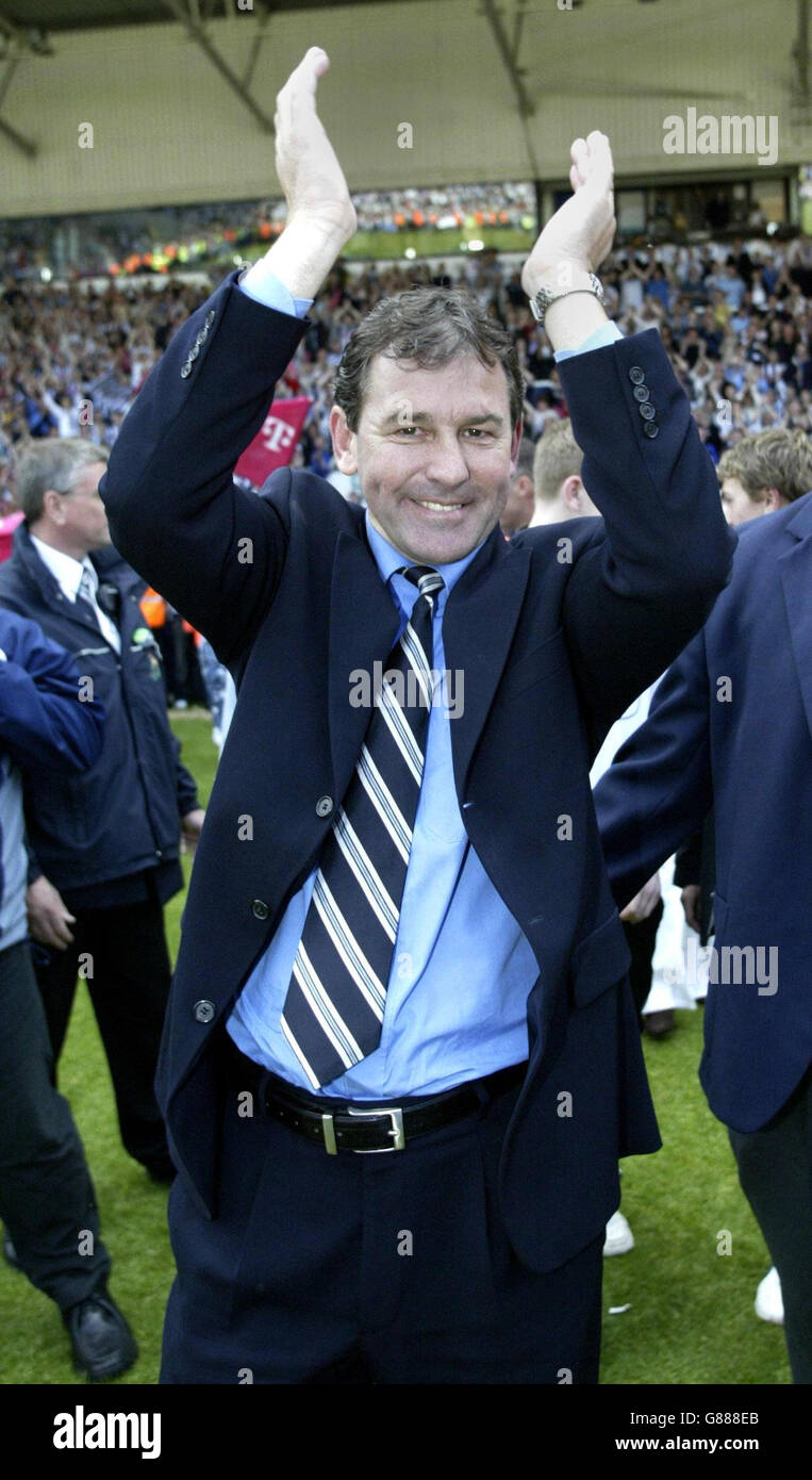 West Bromwich Albion manager Bryan Robson celebrates after being saved ...