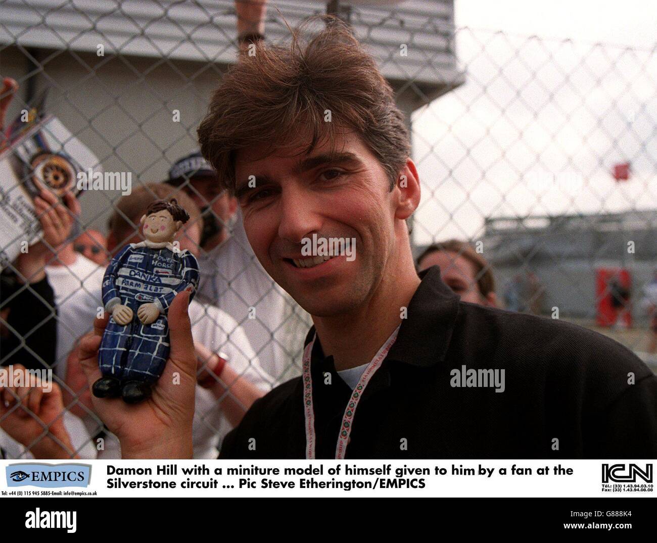 Motor Racing ... British Grand Prix. Damon Hill with a miniture model ...