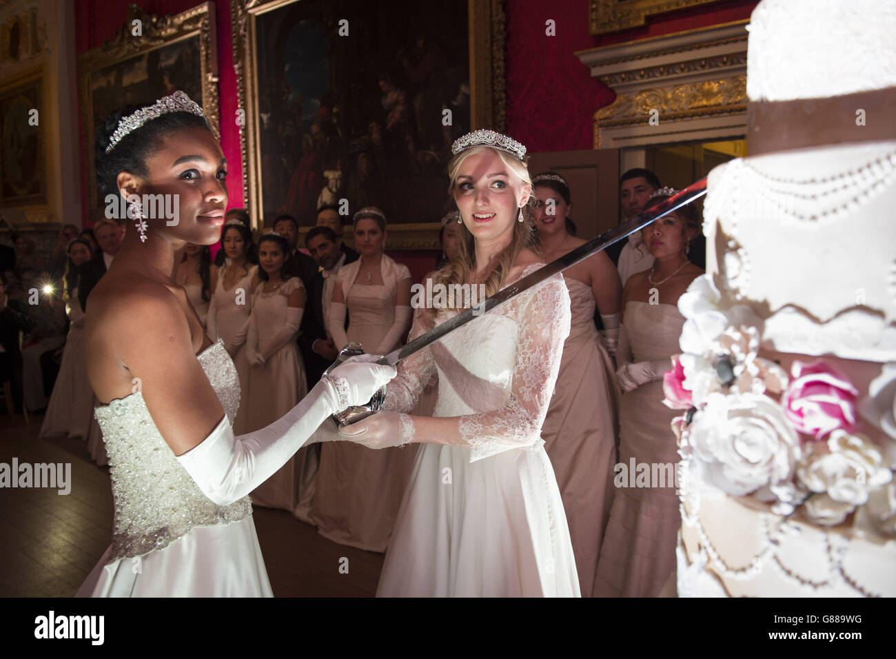 'Debs of the Year' Ritsema Jemide (left) and Amira Rayner cut the cake ...