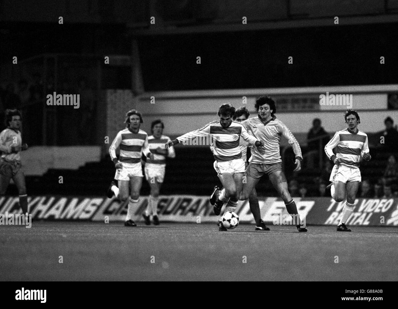 Queens Park Rangers' Warren Neill (c, l) dispossesses Sheffield ...