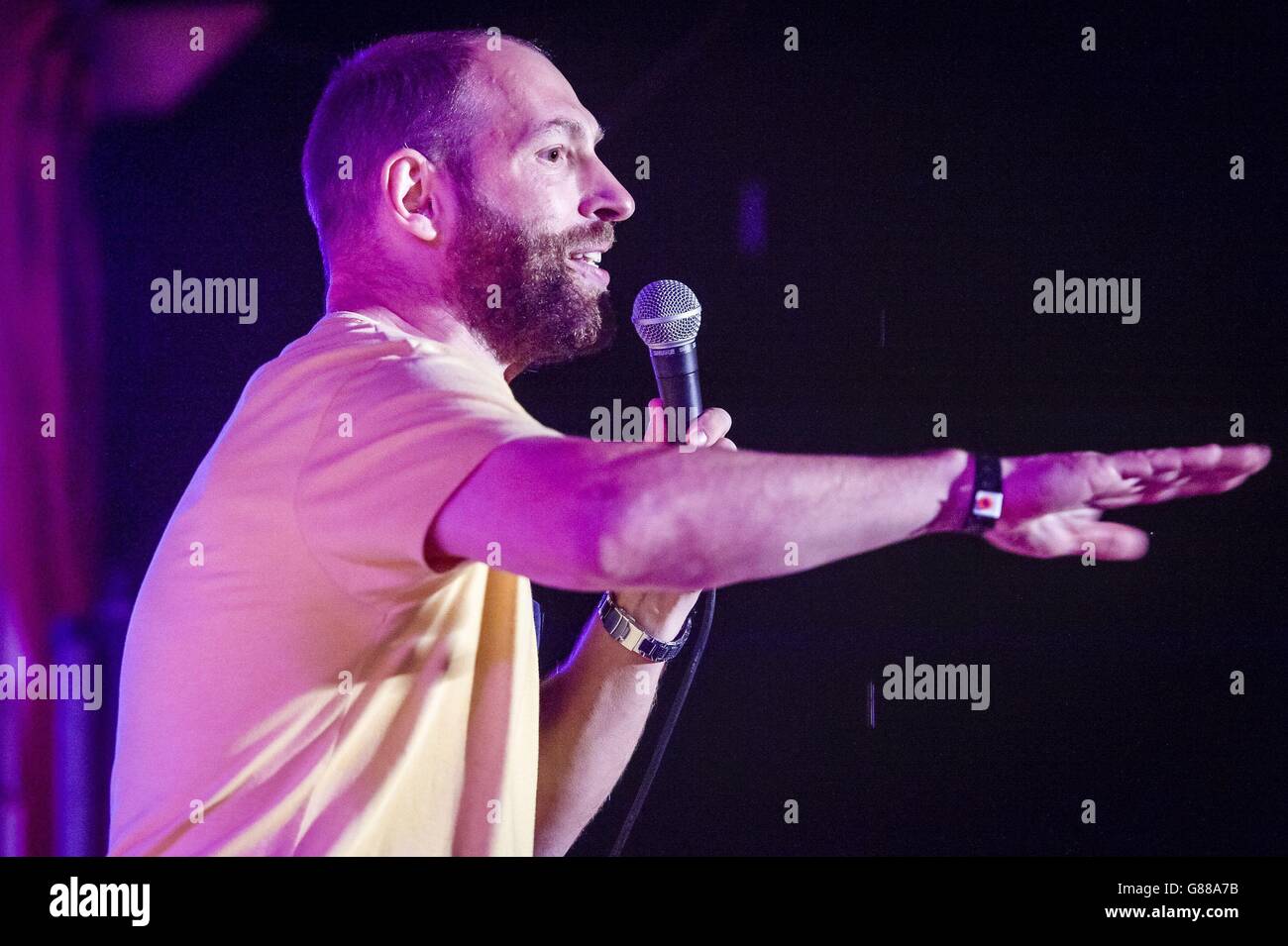 Comedian Adam Bloom performs during an evening of comedy at Banksy's ...