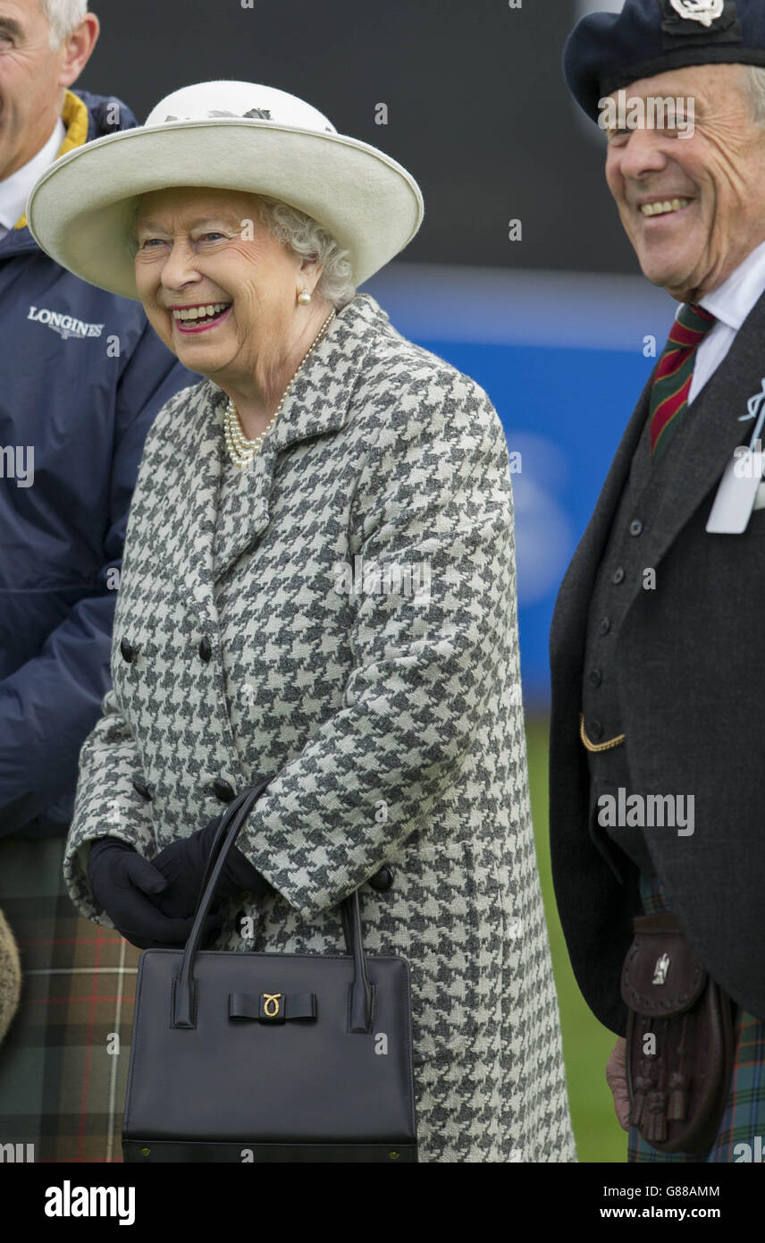 Queen Elizabeth II laughs with Brigadier Melville S Jameson CBE, the ...
