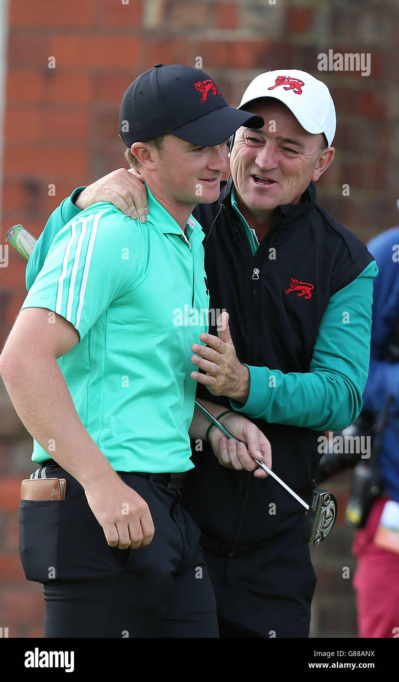 Great Britain and Ireland captain Nigel Edwards celebrates with Paul ...