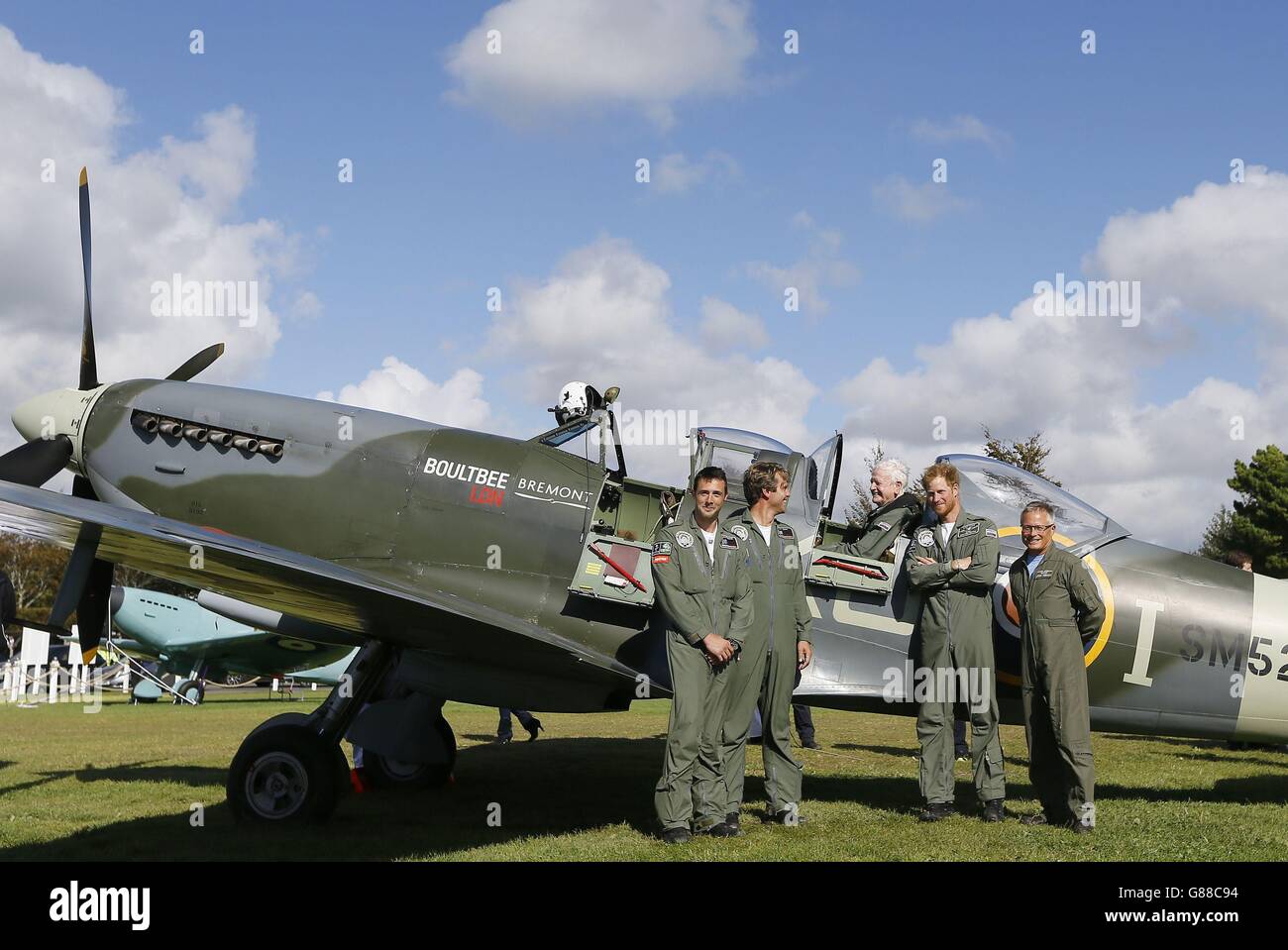 Prince Harry (second right) poses for a photograph with pilots and ...