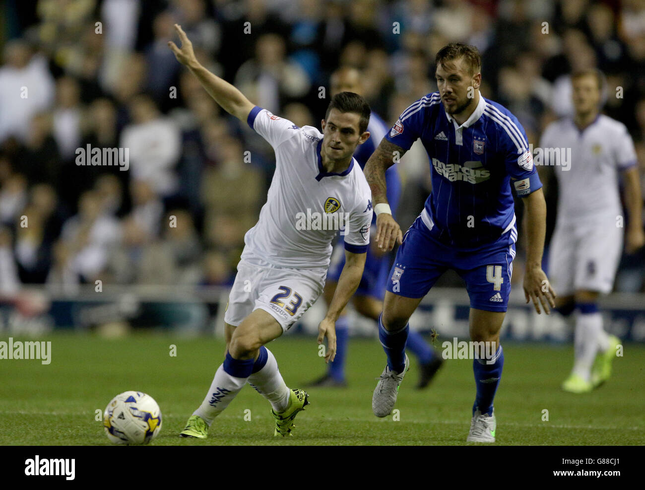 Leeds United's Lewis Cook (left) and Ipswich Town's Luke Chambers ...