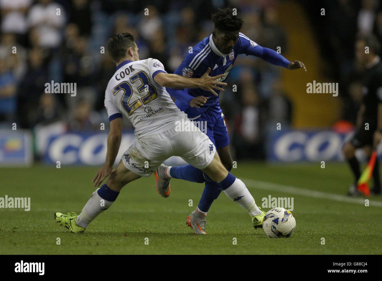 Leeds United's Lewis Cook (left) challenges Ipswich Town's Ainsley ...