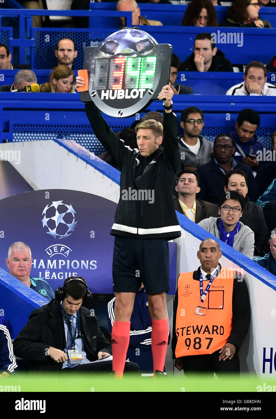 The fourth official raises his board during the UEFA Champions League ...