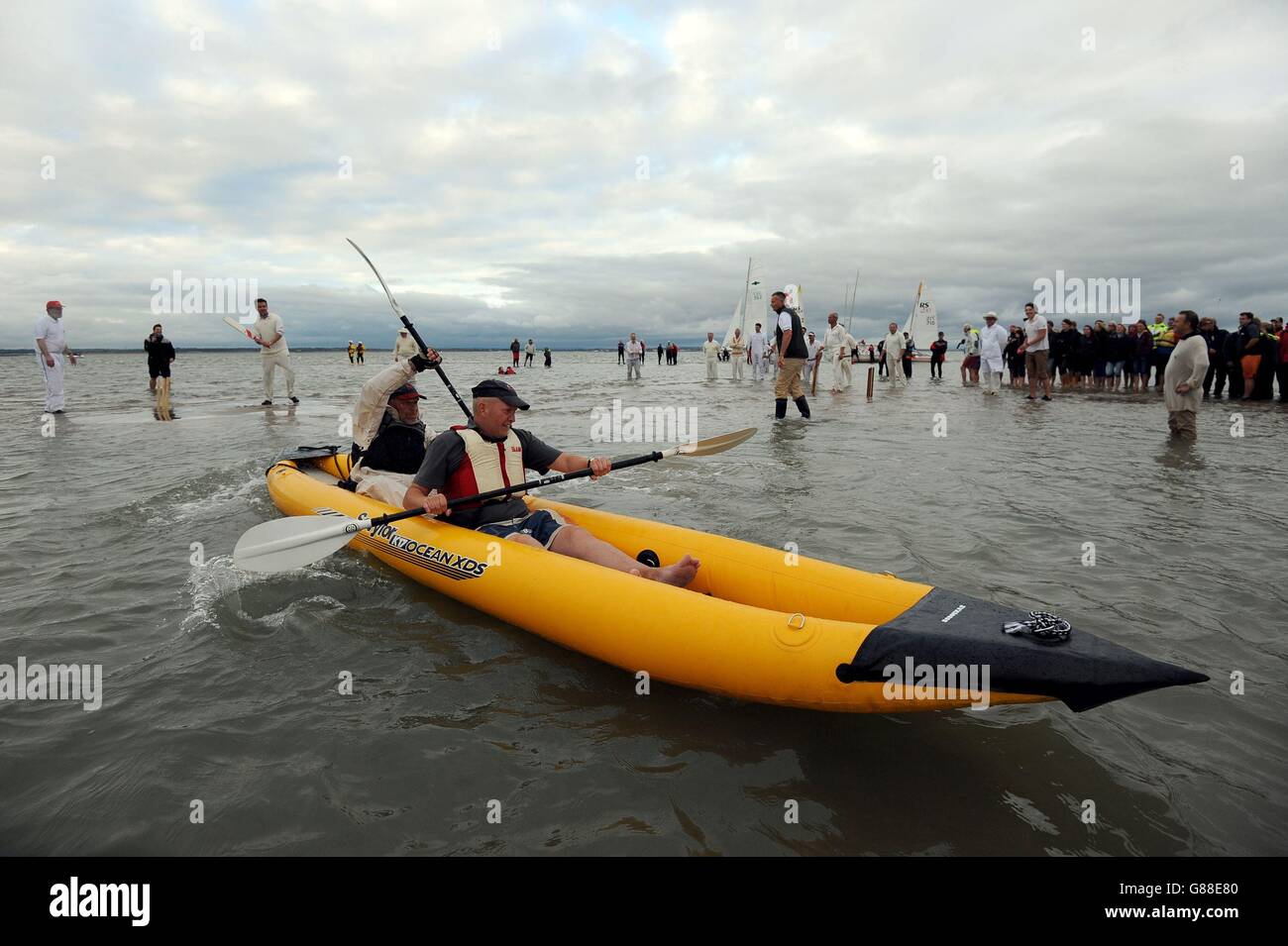 A pair of canoeists paddle through the pitch during the annual Bramble ...