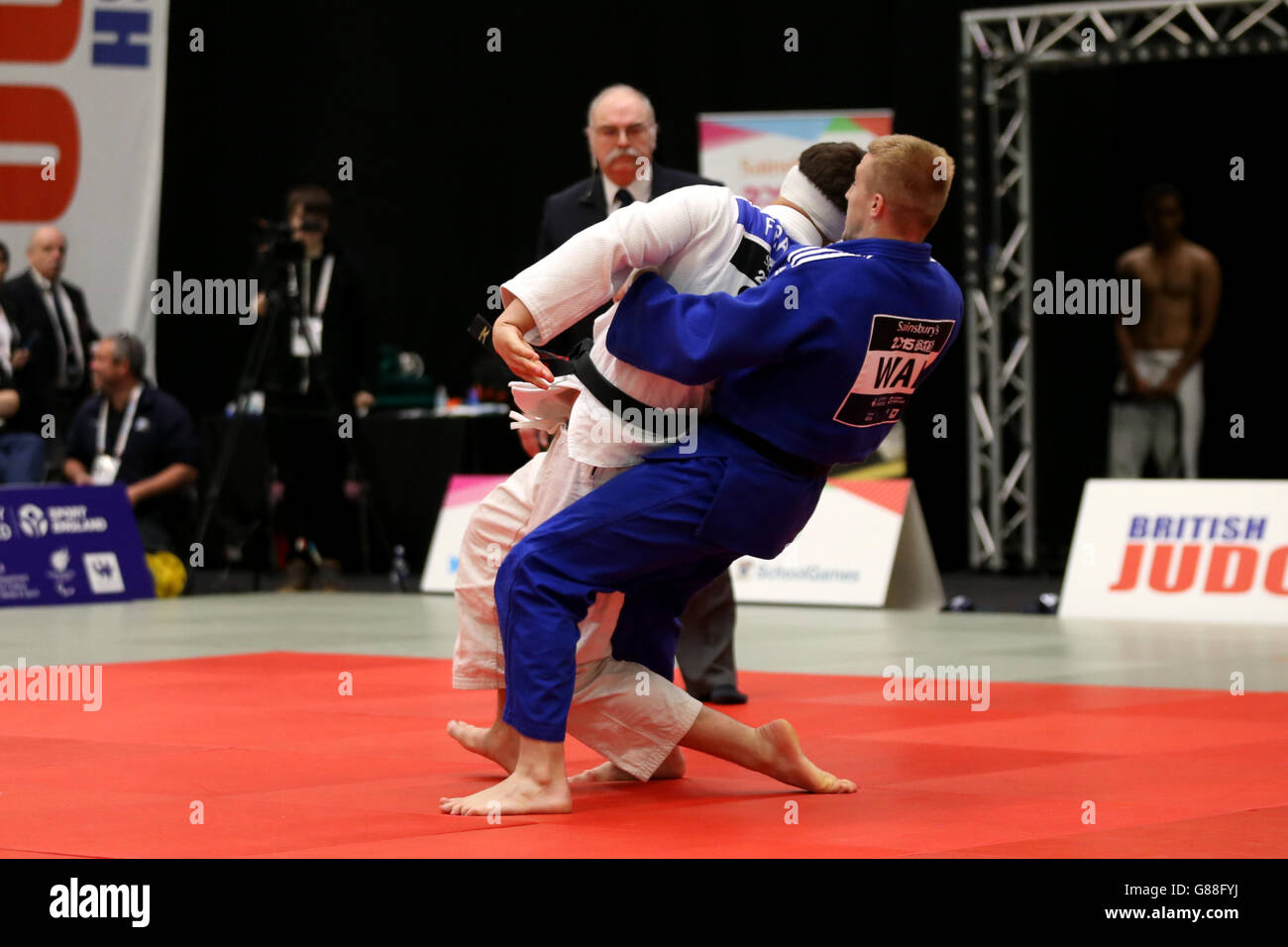 Scotland's Cailin Calder (white) and Wales' Rhodri Morgan (blue ...