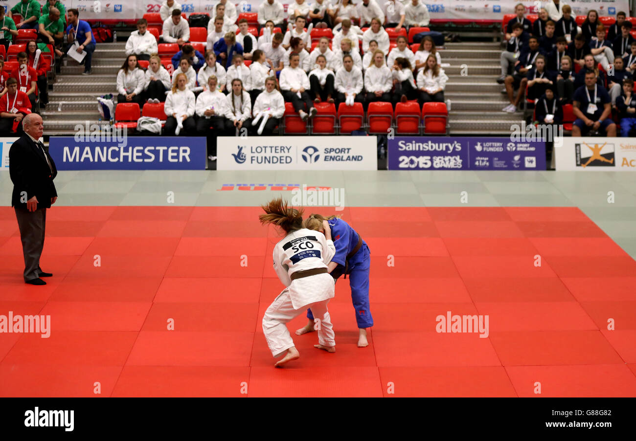 Scotland's Imogen Walls (white) and England's Sian Bobrowska (blue ...