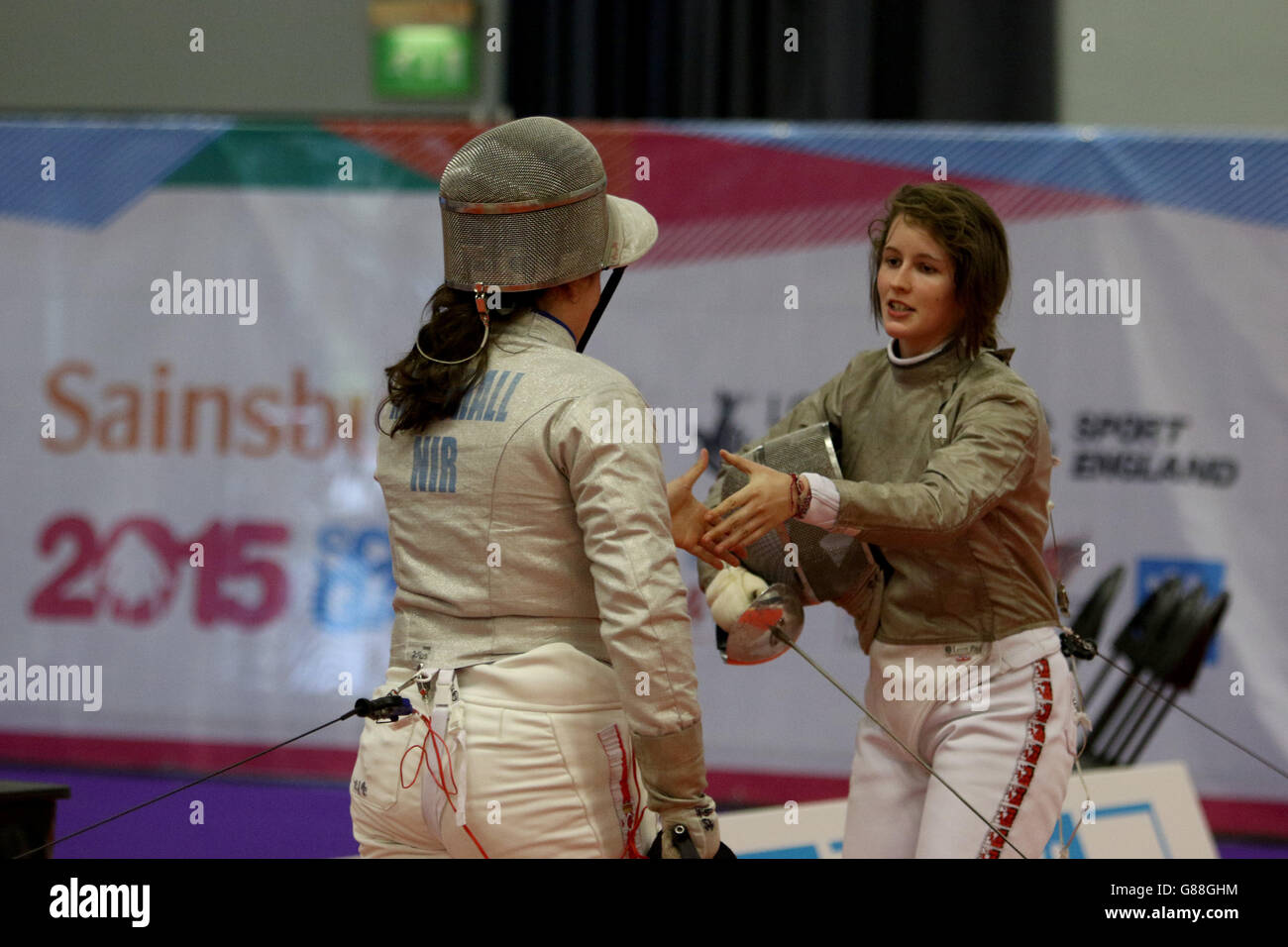 Wales fencer Megan Ware (right) shakes hands with Northern Ireland's ...