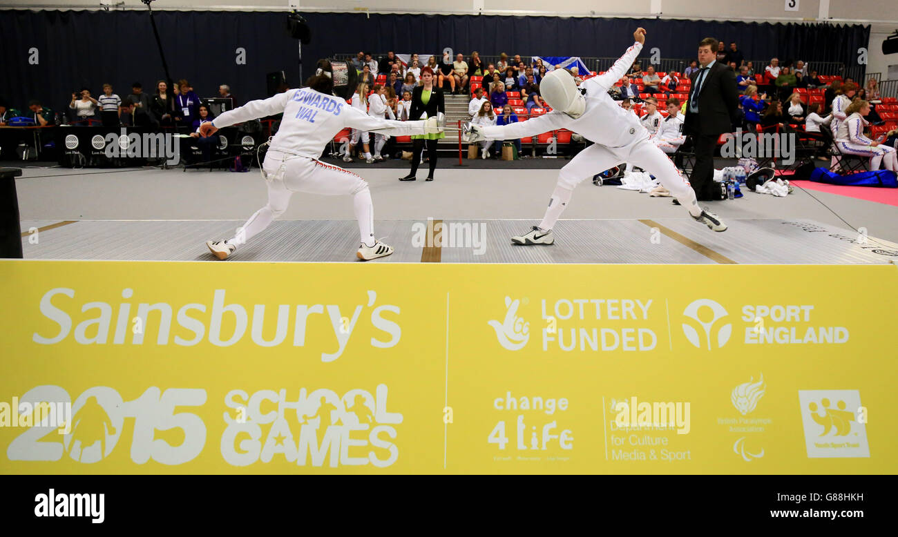 Wales' Owen Edwards (left) fights England's Thomas Dickson in the Men's ...