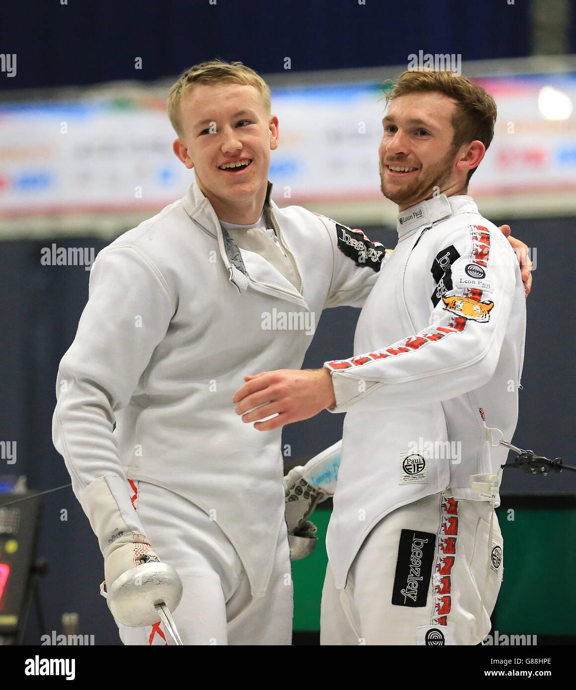 England's Owen Jordan (left) celebrates winning the Men's Epee Team ...
