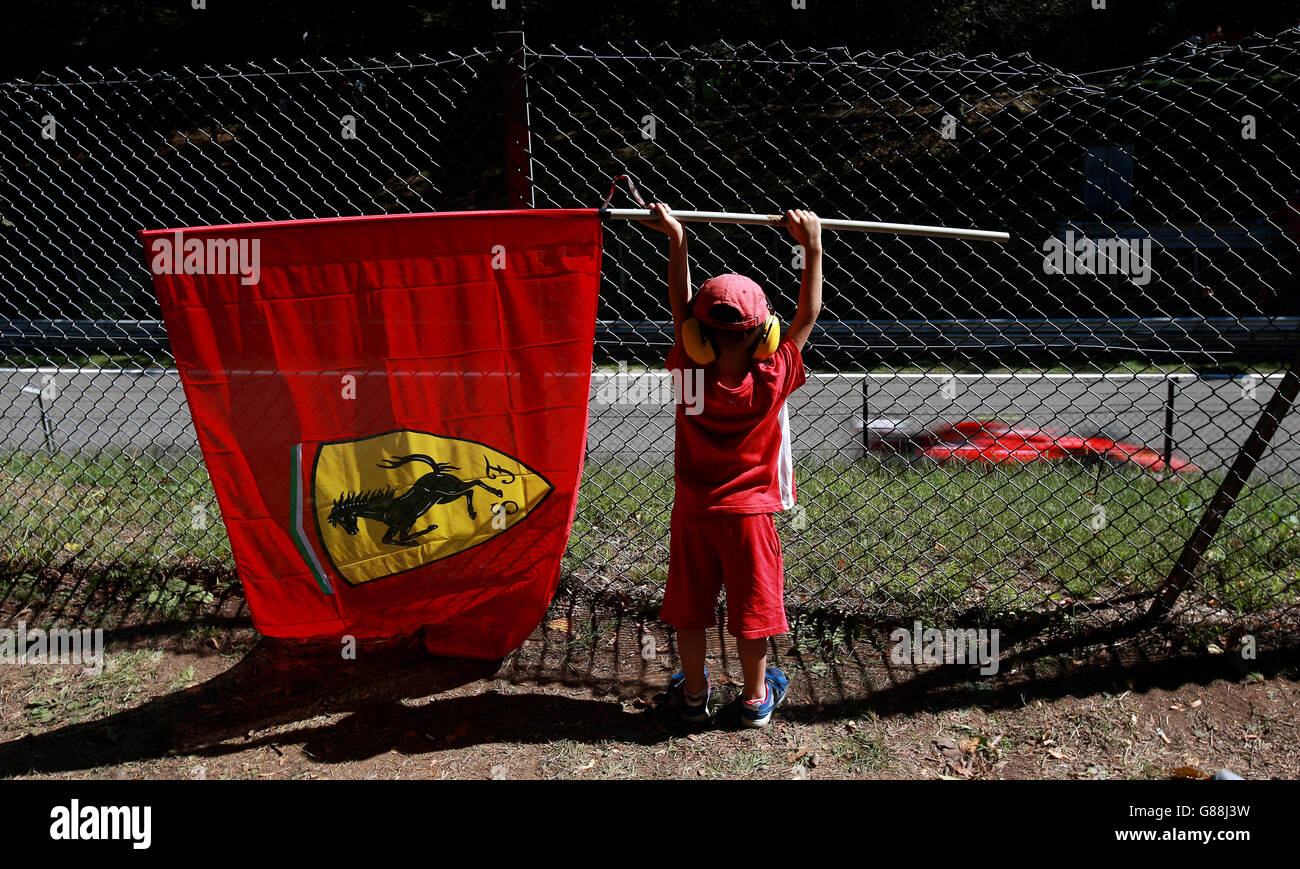 A young Ferrari fan watches the action during the 2015 Italian Grand ...