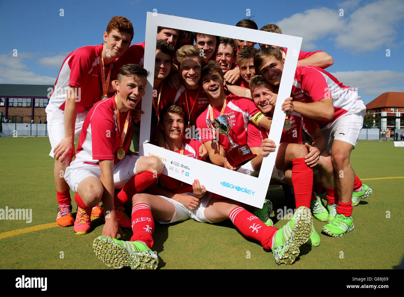 Ulster boys pose with the 1st place trophy and gold medals during the ...