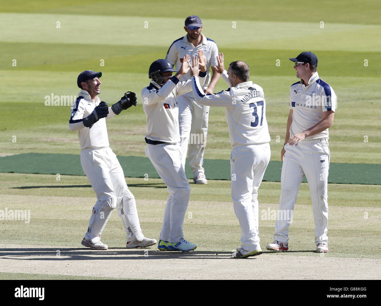 Yorkshire's James Middlebrook (second right) celebrates with teammates ...