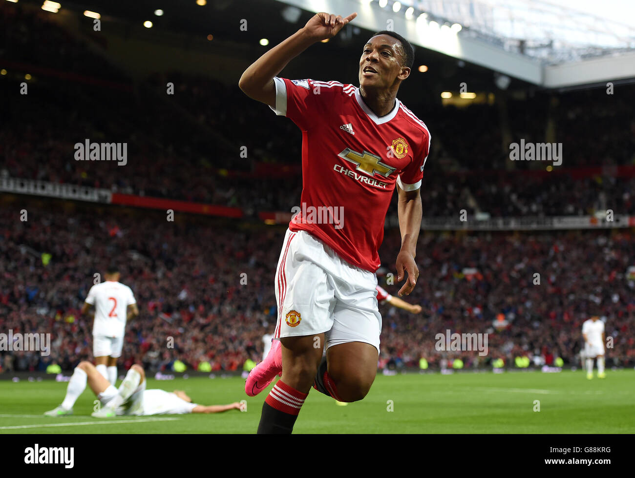 Manchester United's Anthony Martial celebrates scoring his side's third ...