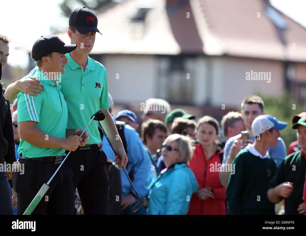 Great Britain and Ireland's Paul Dunn gets a hug from team mate Gary ...
