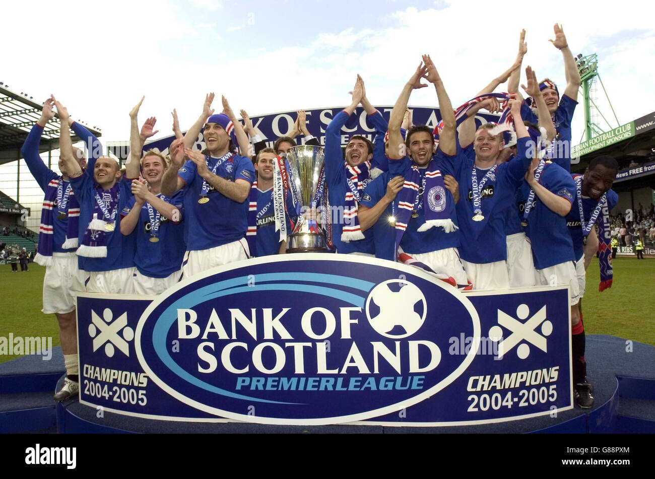 Rangers players celebrate after winning the spl trophy hi-res stock ...