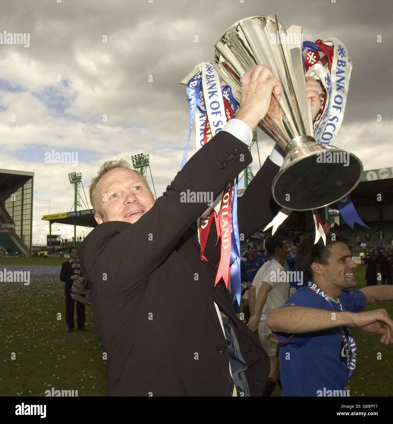 Rangers' manager Alex McLeish holds the SPL Trophy after defeating ...
