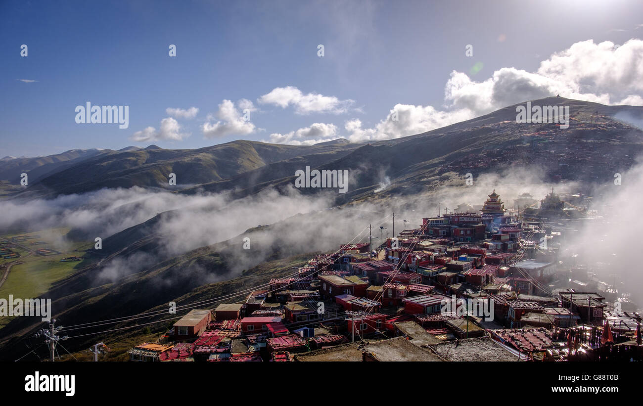 Sertar cityscape with Larung Gar Buddhist Academy and mountains ...