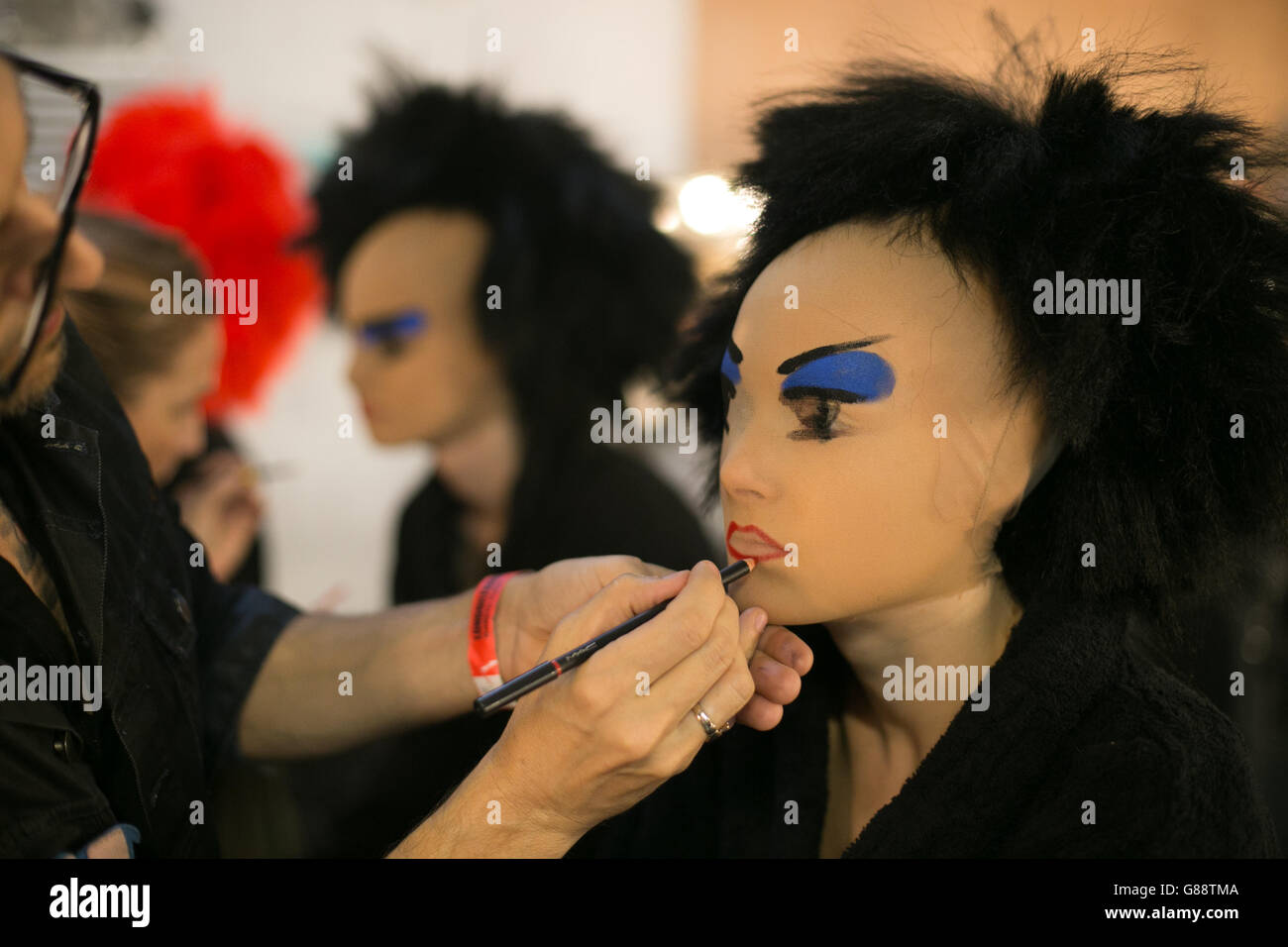 A model get ready for the Gareth Pugh show Spring/Summer 2016 London ...