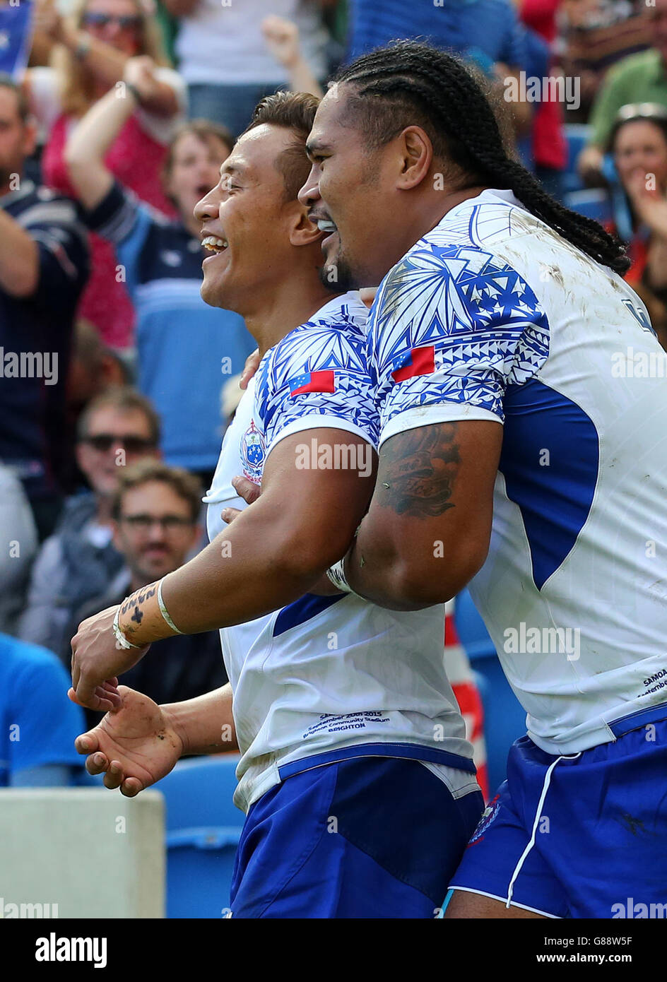 Samoa's Tim Nanai-Williams (left) celebrates his try with Alesana ...