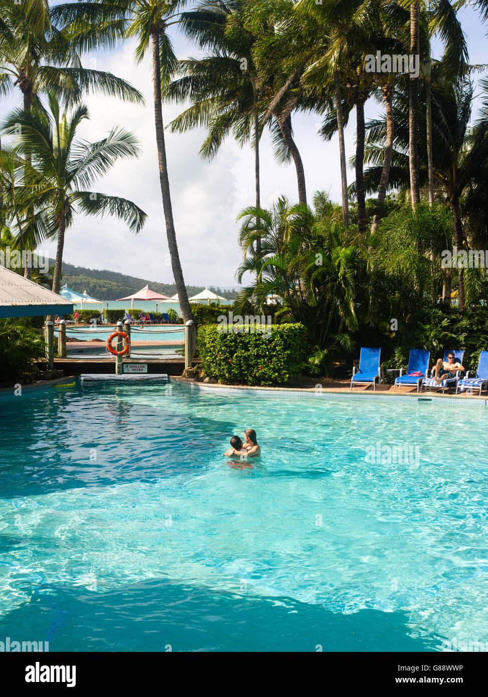 Relaxing in the pool at Daydream Island Resort; Whitsunday Islands, QLD ...