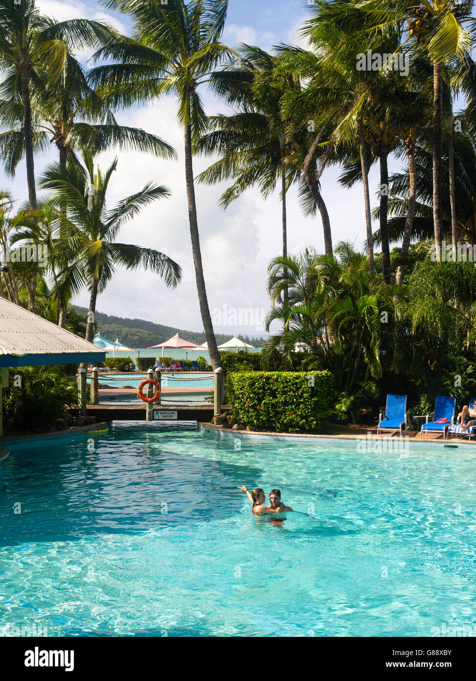 Relaxing in the pool at Daydream Island Resort; Whitsunday Islands, QLD ...