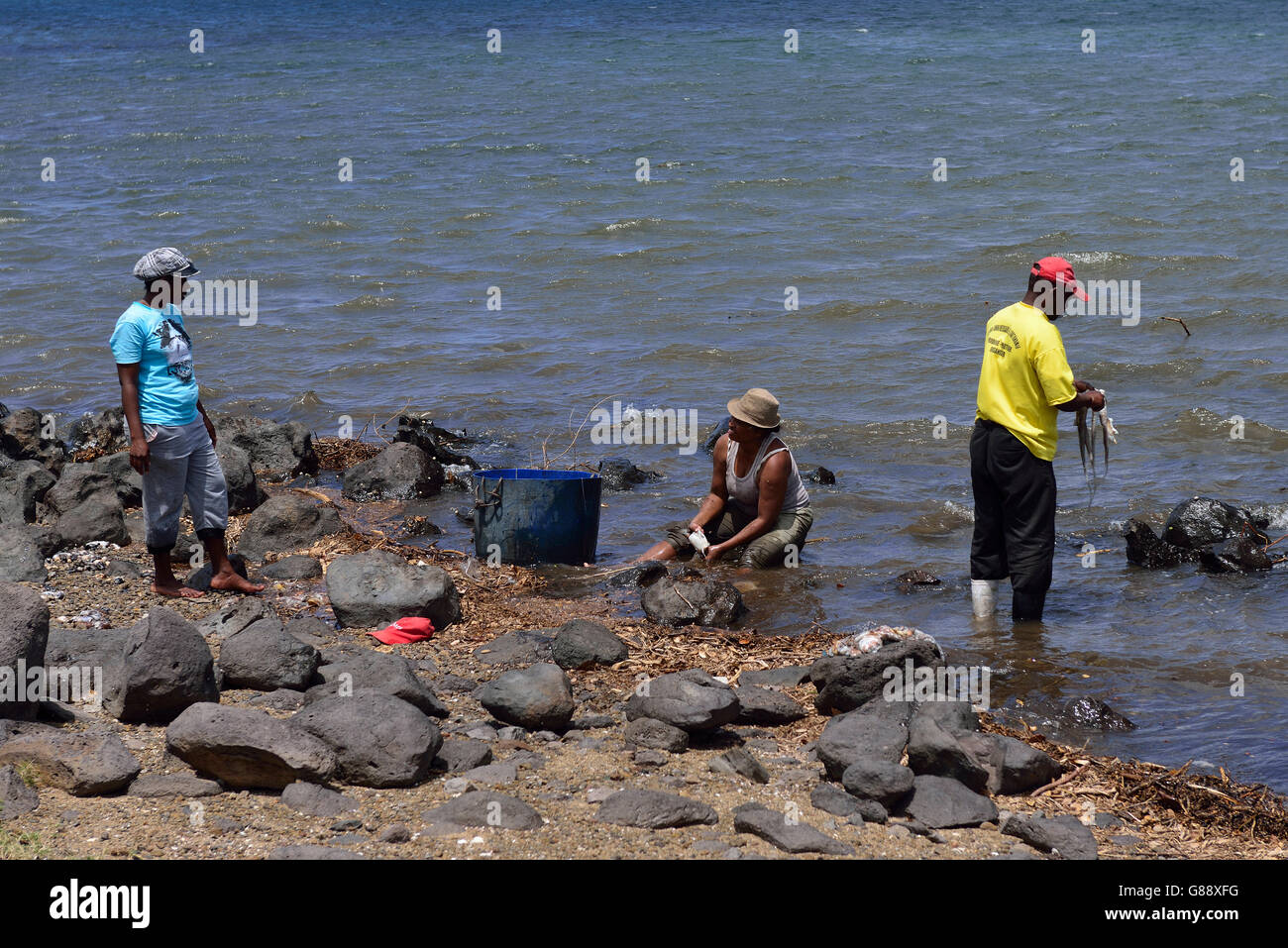 octopus fisherwoman, Anse Baleine, Rodrigues Stock Photo - Alamy