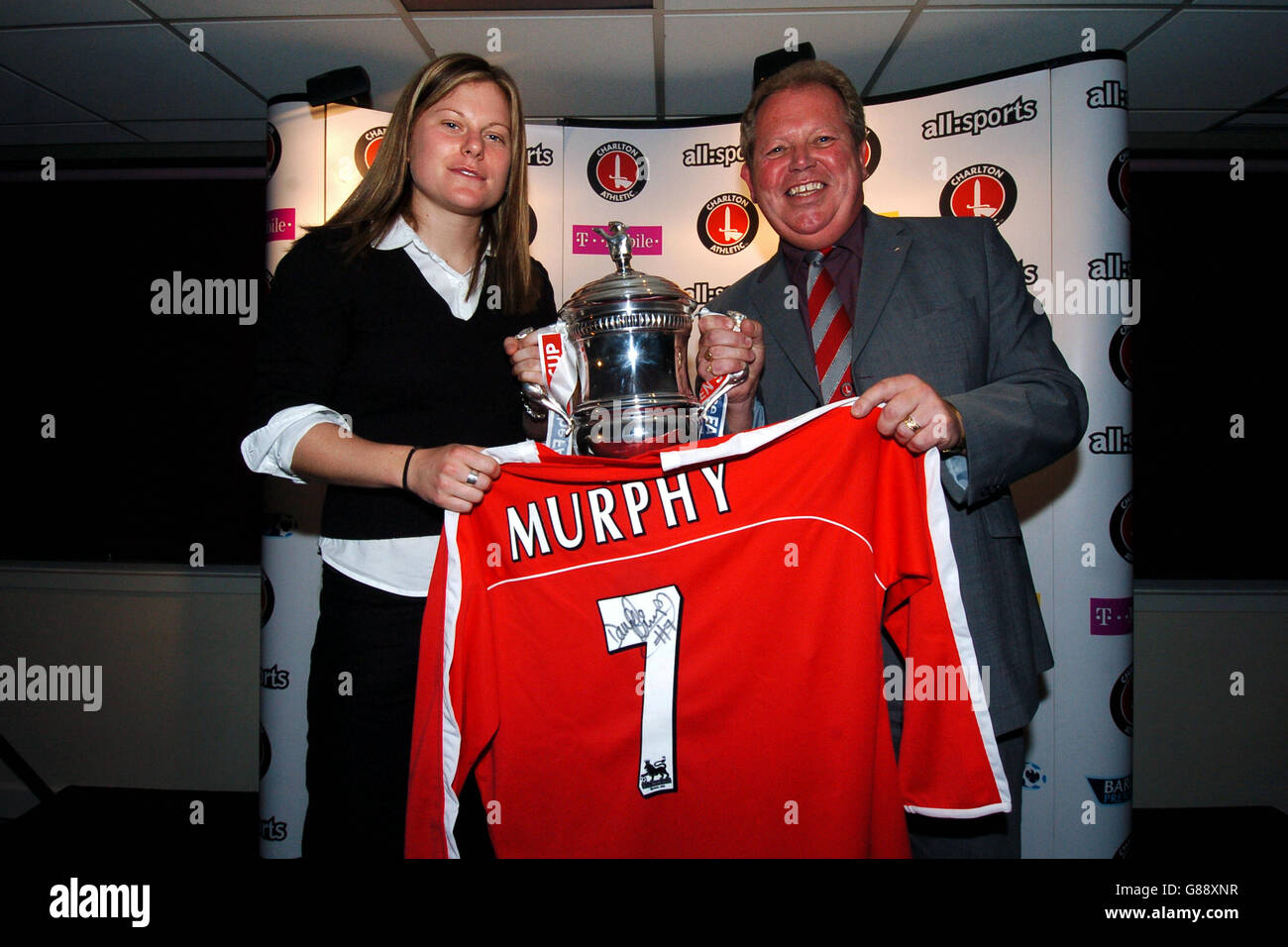 Charlton Athletic's Danielle Murphy presents her sponsor with a signed ...