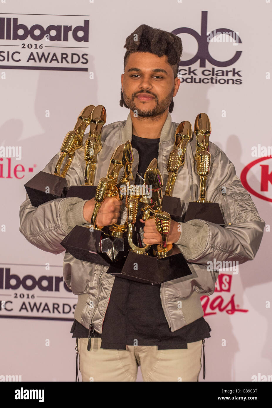 Recording artist The Weeknd poses in the press room at the 2016 ...
