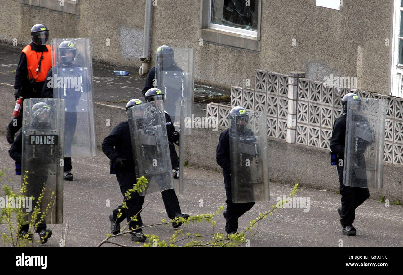 Police officers in riot gear train at a disused hospital in South ...