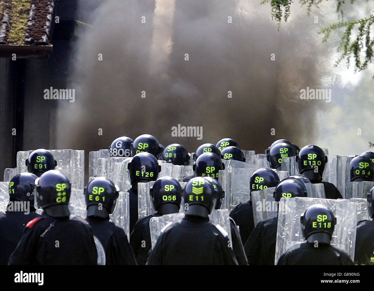 Police officers in riot gear train at a disused hospital in South ...