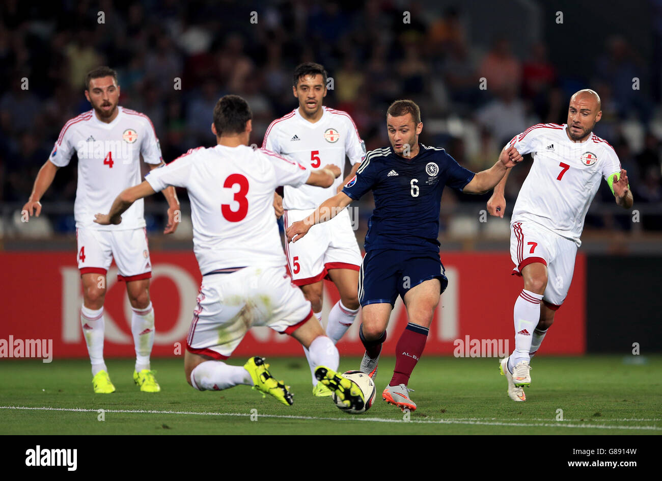 Scotland's Shaun Maloney (right) and Georgia's Solomon Kverkvelia ...