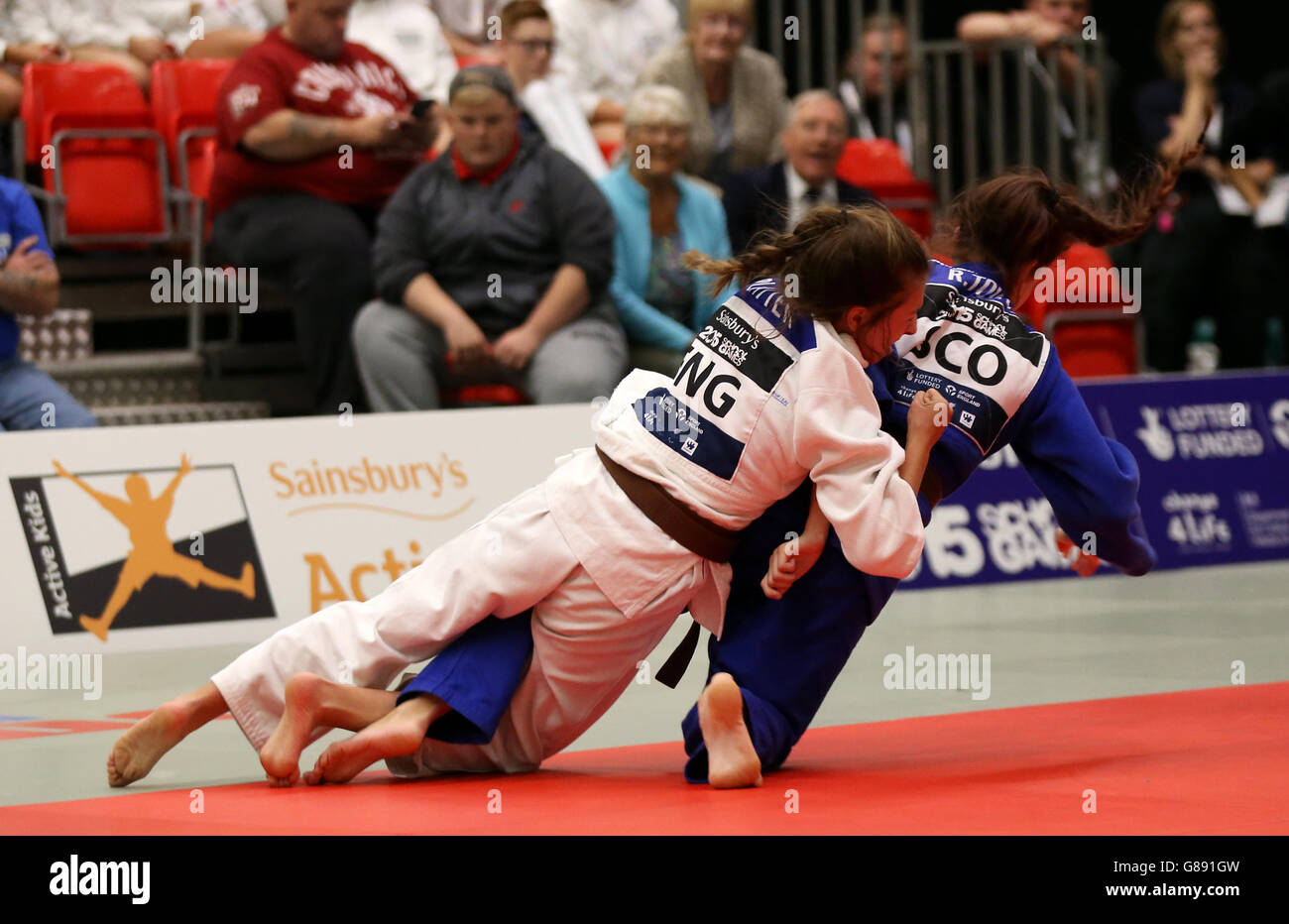 England's Amy Platten (white) competes against Scotland's Rachel Towle ...