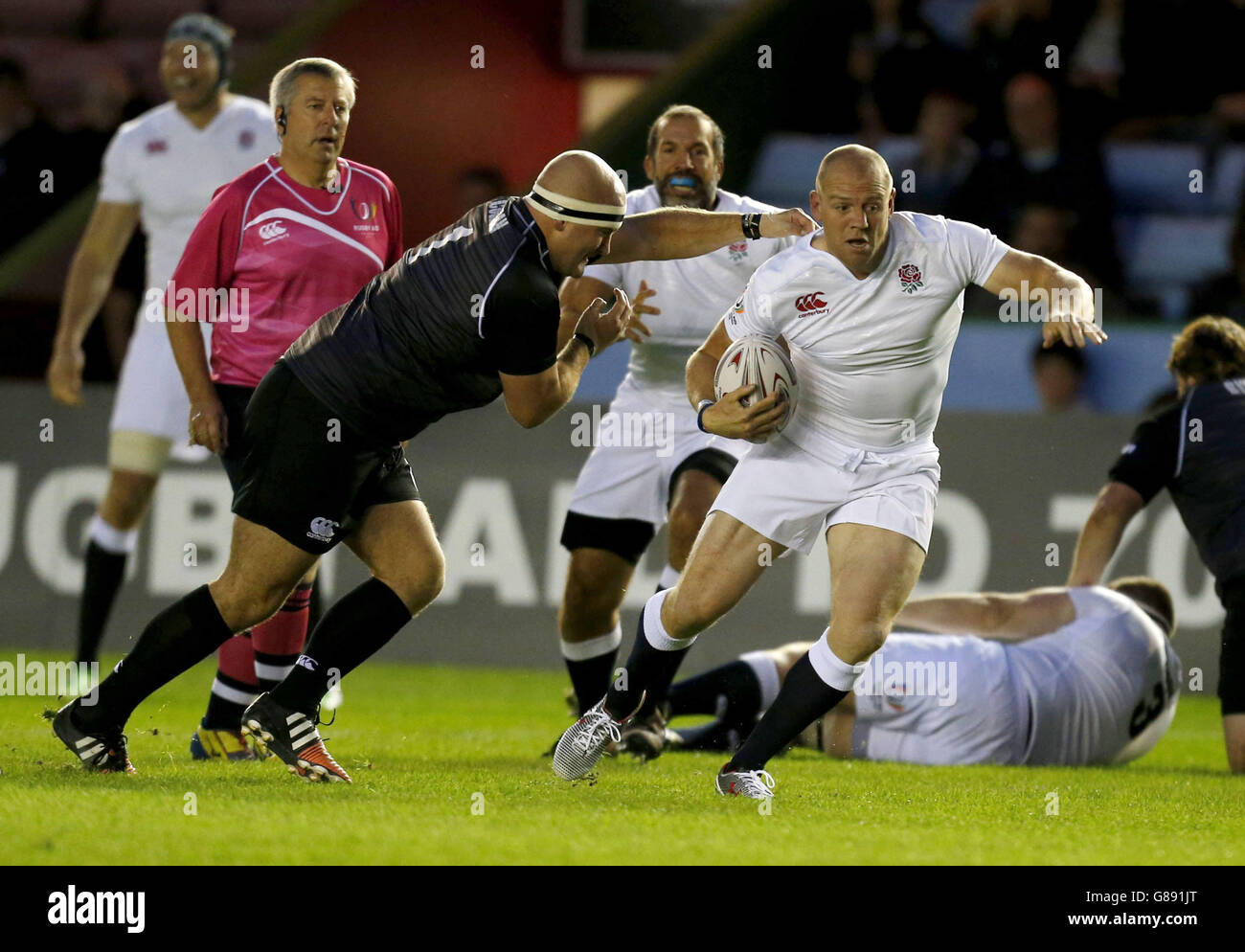 Team England's Mike Tindall and Rest of the World's Tim Coghlan during ...