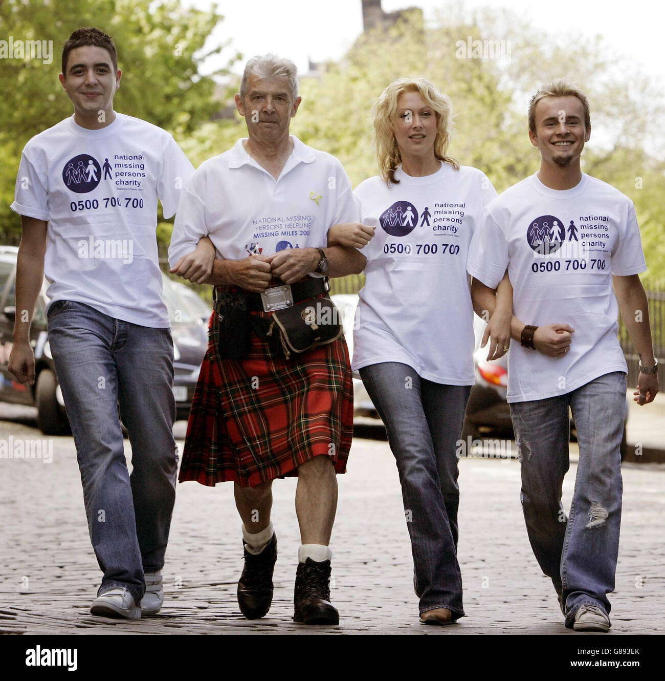 Social charity celebrity walking tartan kilt hi-res stock photography ...