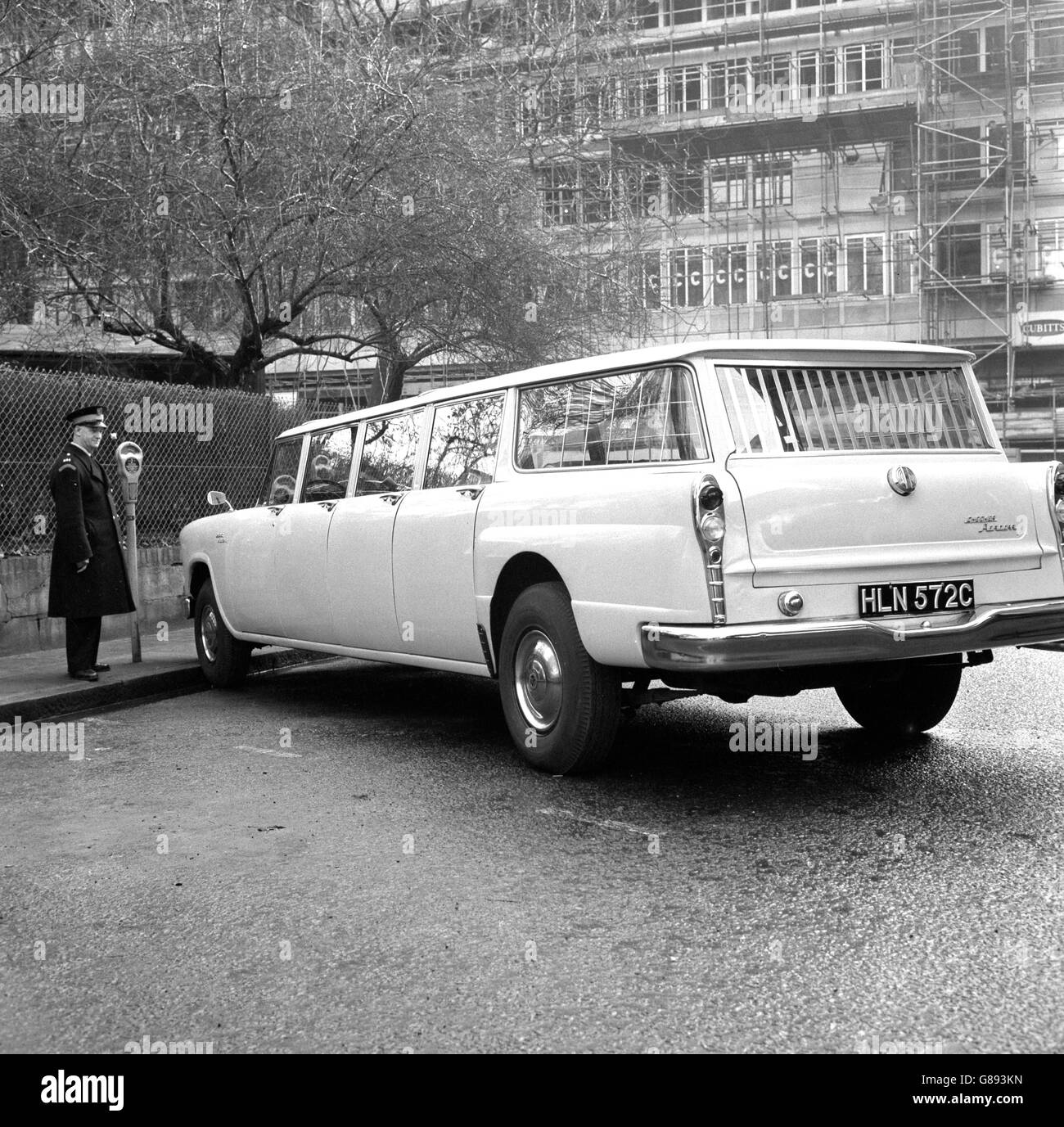 A london traffic warden looks at an eight door checker areobus hi-res ...