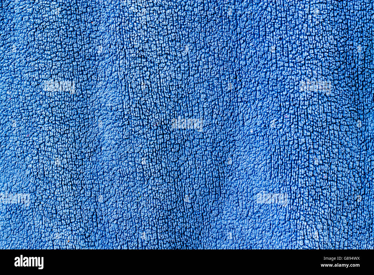 fabric cloth, typically produced by weaving or knitting textile fibers ...