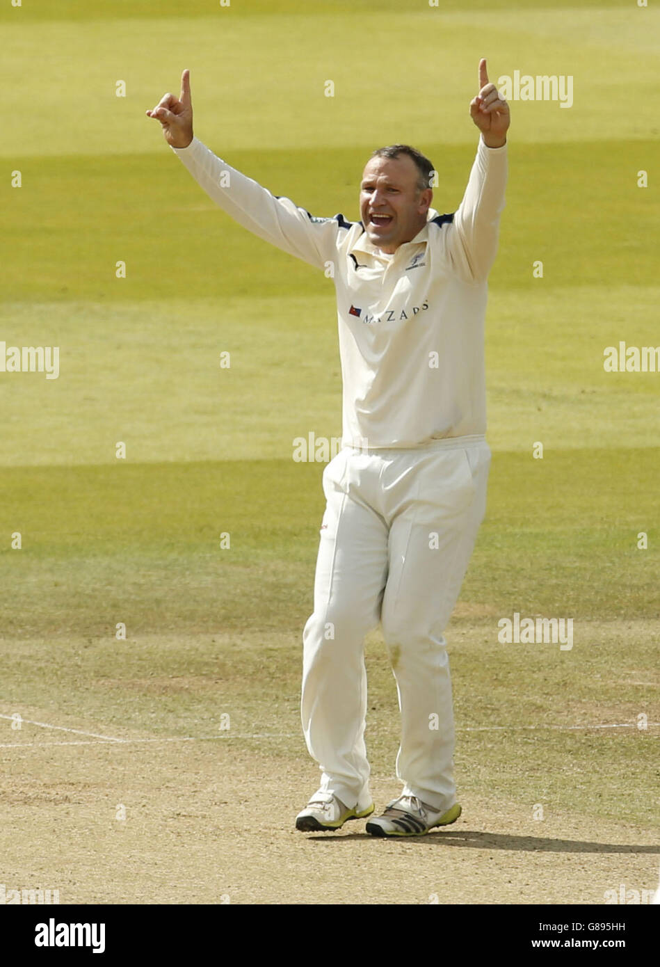 Yorkshire's James Middleton celebrates taking the wicket of Middlesex's ...